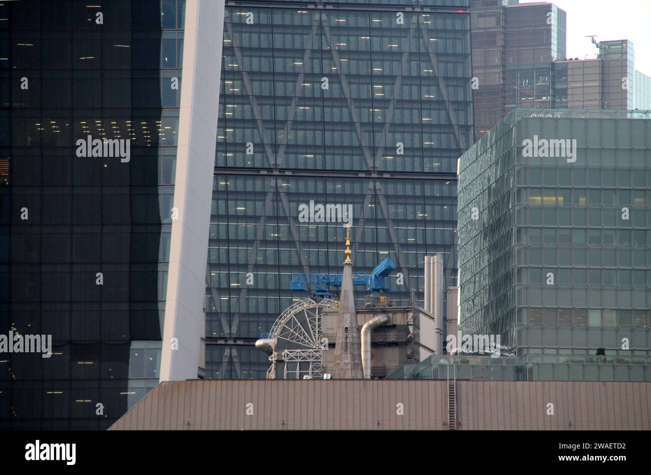 An impressive brick building with a detailed clock tower on the roof ...