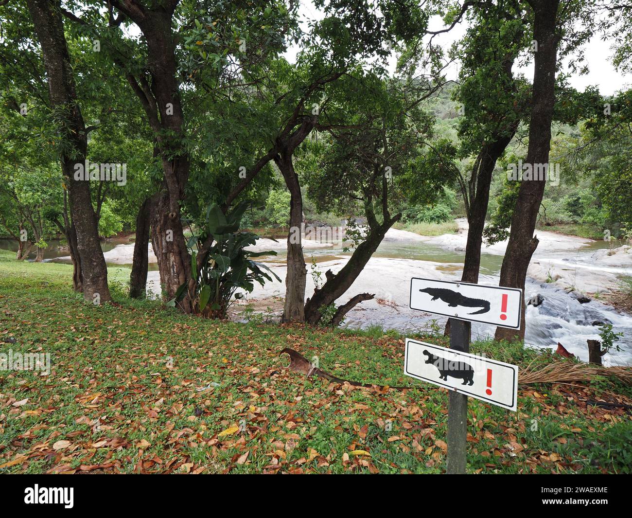 Warning signs in a hotel compound in Hazyview. In the rainy season the ...