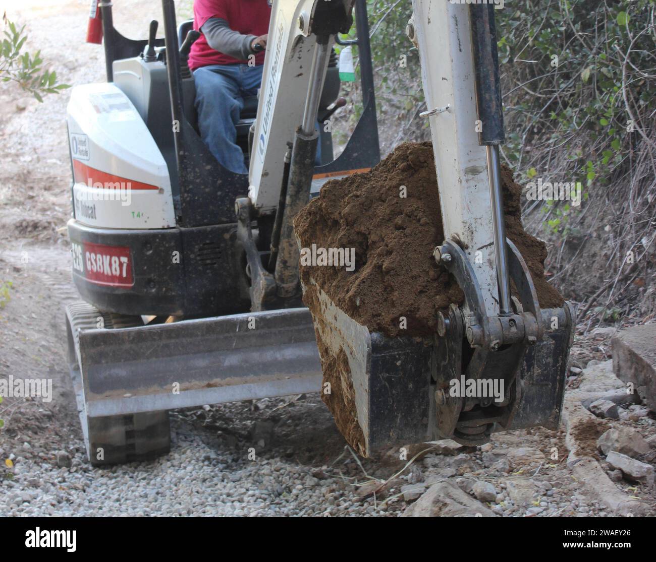 earthworks with an excavator in civil engineering on a construction ...