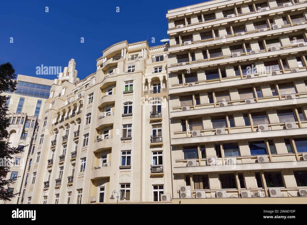 Day low angle view of a block of flats with air conditioning units ...