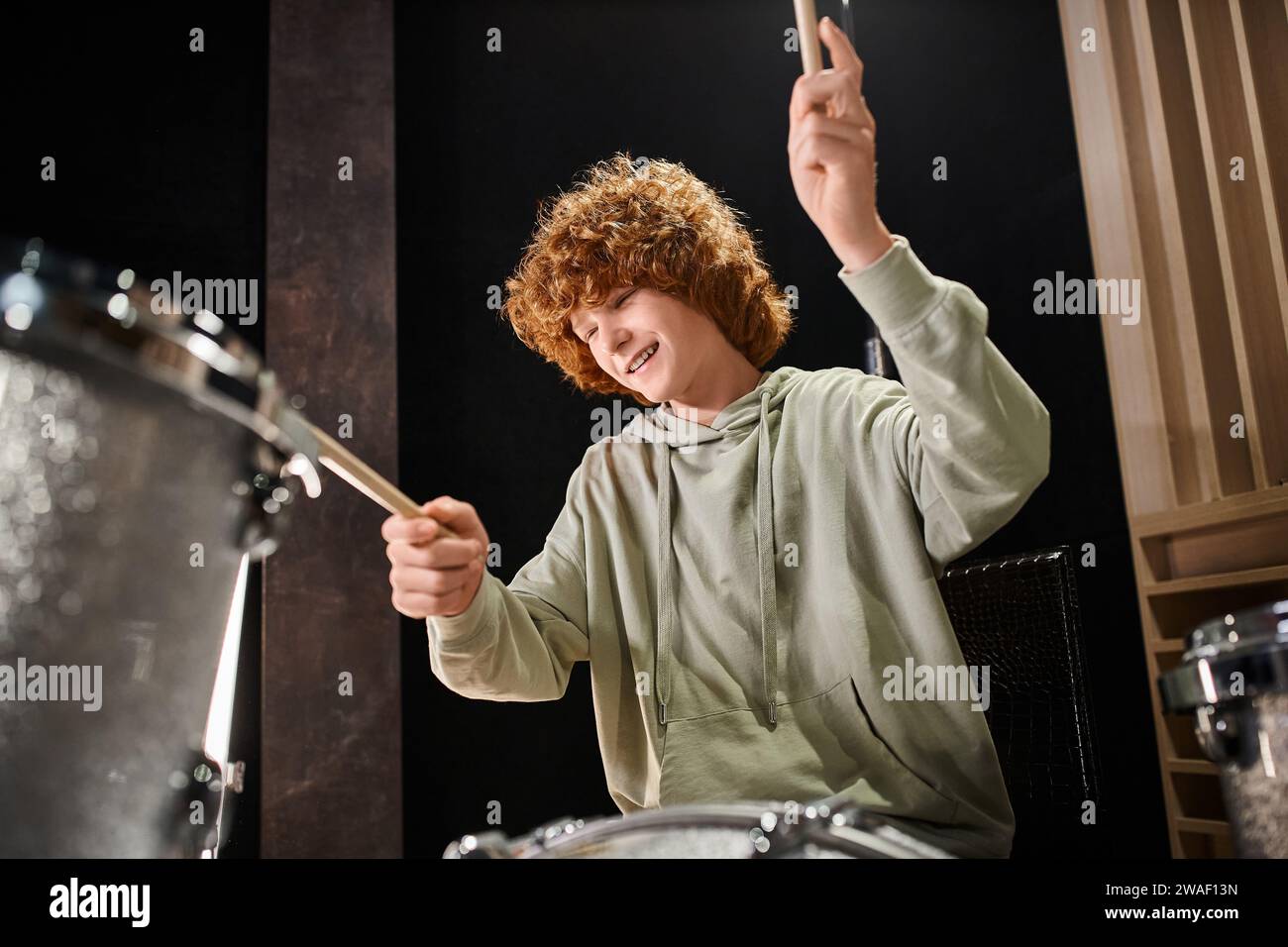 Teenager play drums hi-res stock photography and images - Alamy