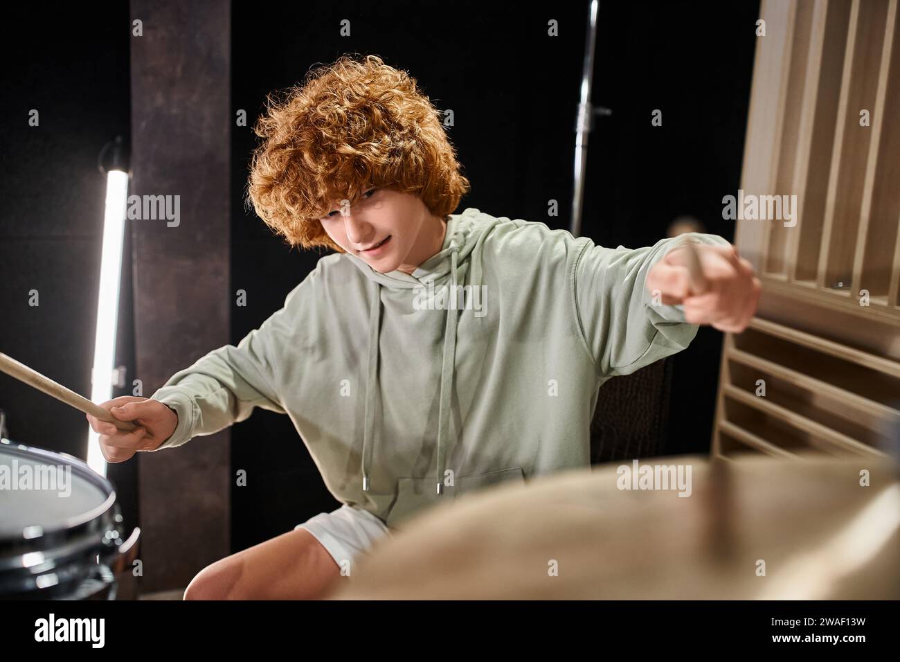 Teenager play drums hi-res stock photography and images - Alamy