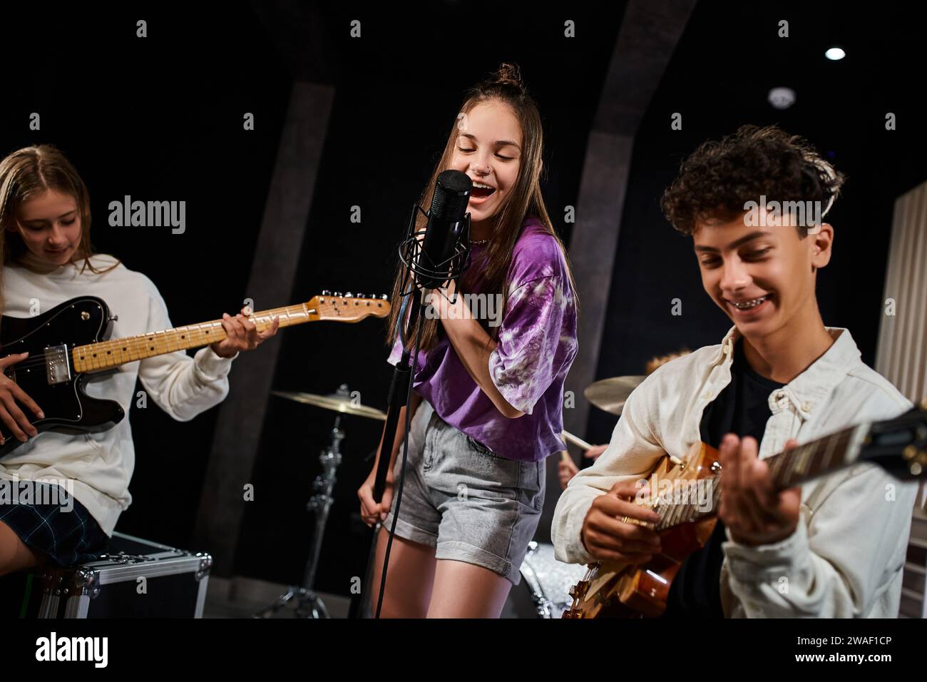 Teens musical instruments hi-res stock photography and images - Alamy