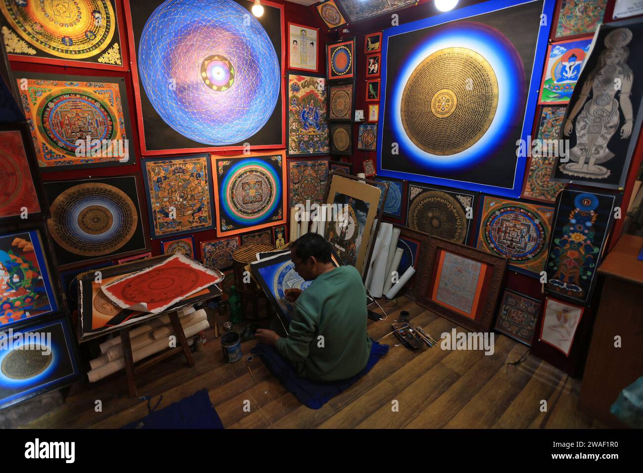 Kathmandu, Nepal -November 20 2023: artist work in Thangka stores is ...