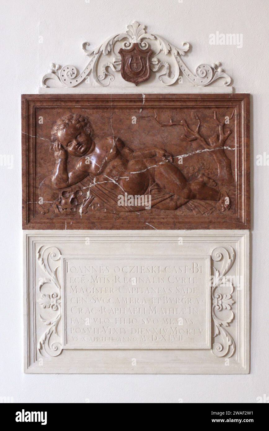 Cracow. Krakow. Poland. Marble epitaph depicting sleeping (dead) little ...