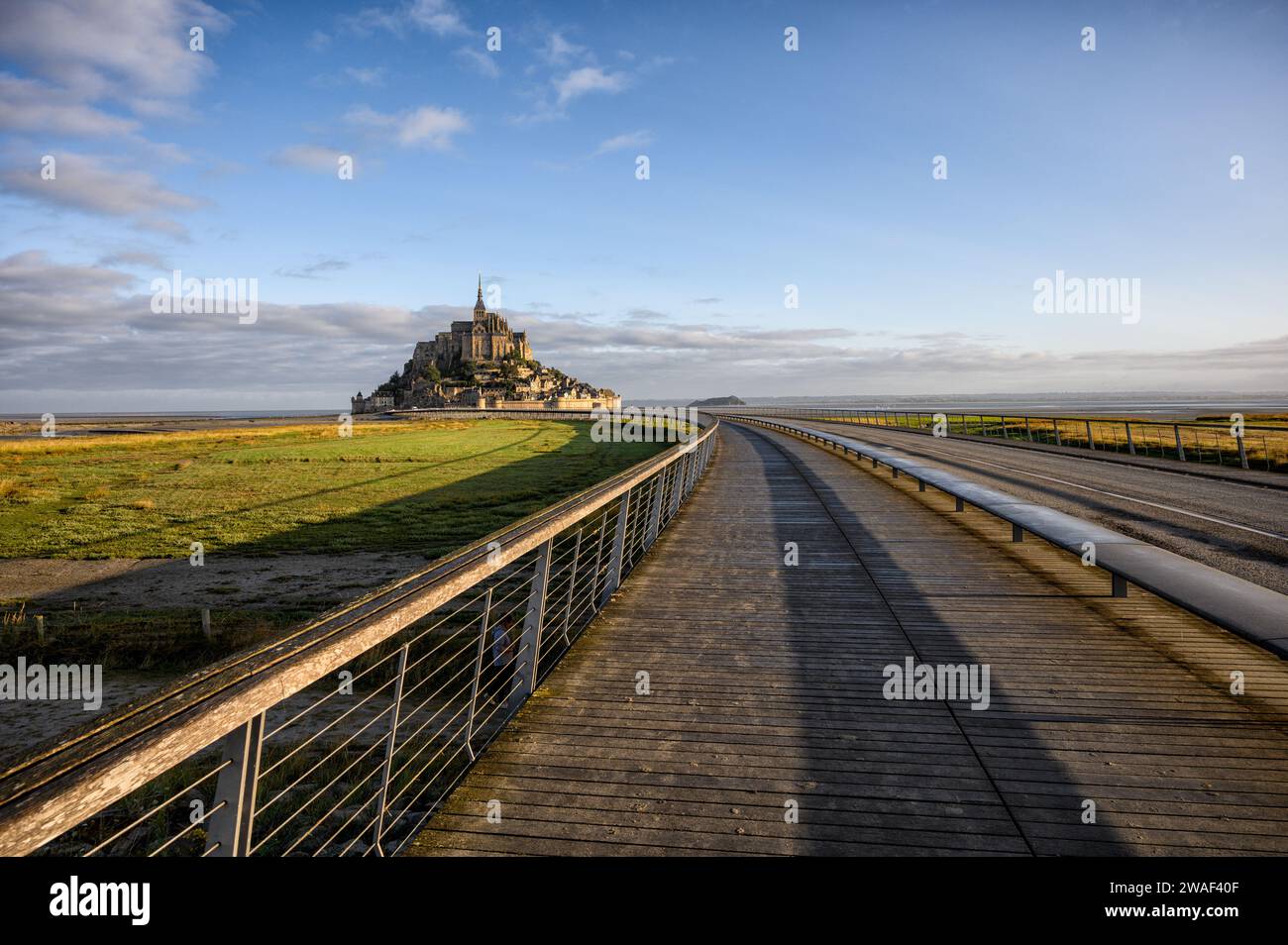 Landscape of Mont Saint-Michel castle and abbey in the early morning ...
