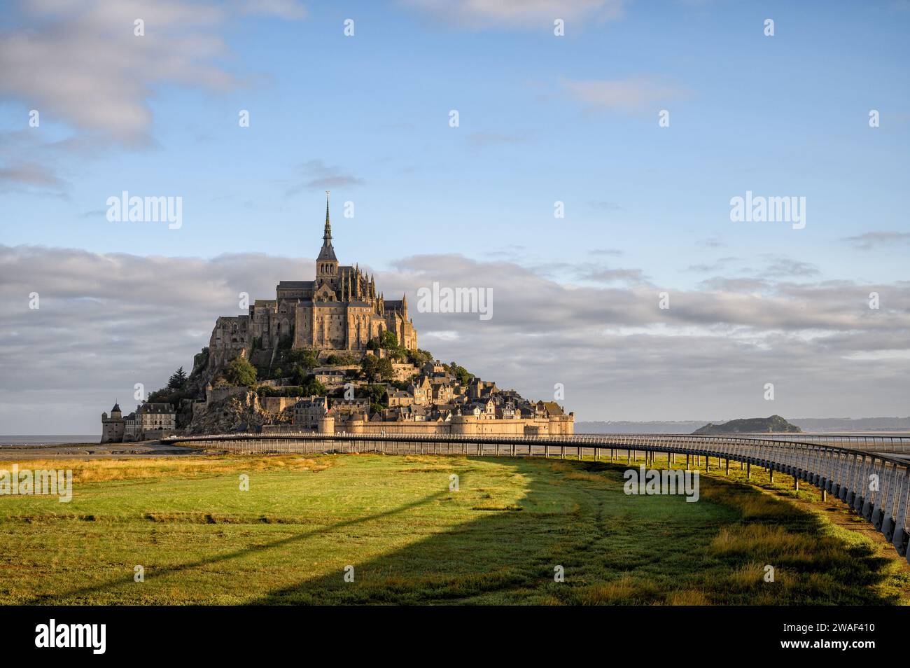 Landscape of Mont Saint-Michel castle and abbey in the early morning ...