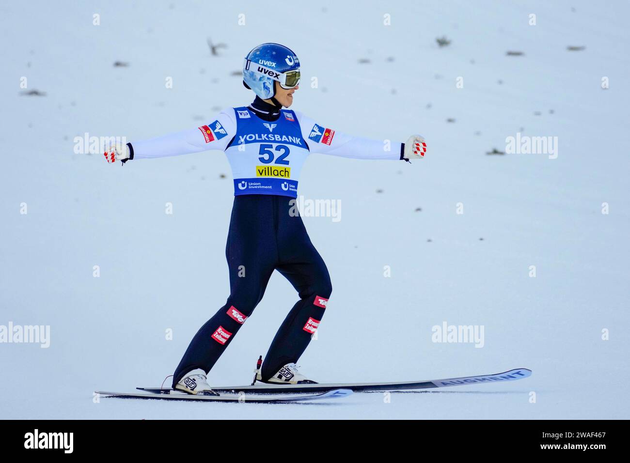 Austria's Eva Pinkelnig reacts after competing at the Women Normal Hill ...