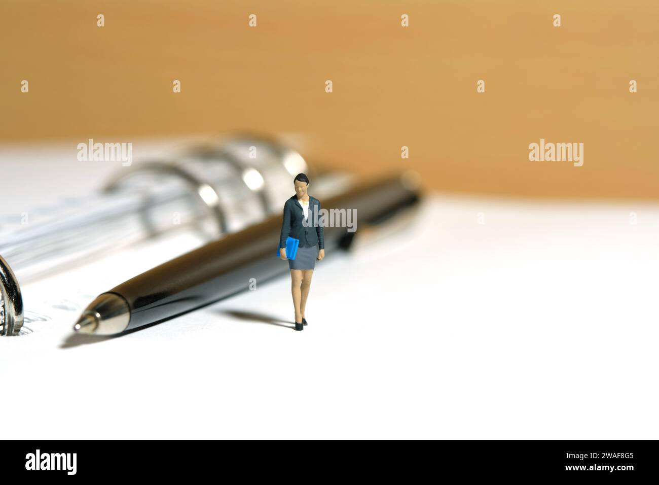 Miniature people toy figure photography. Minutes of meeting, schedule ...