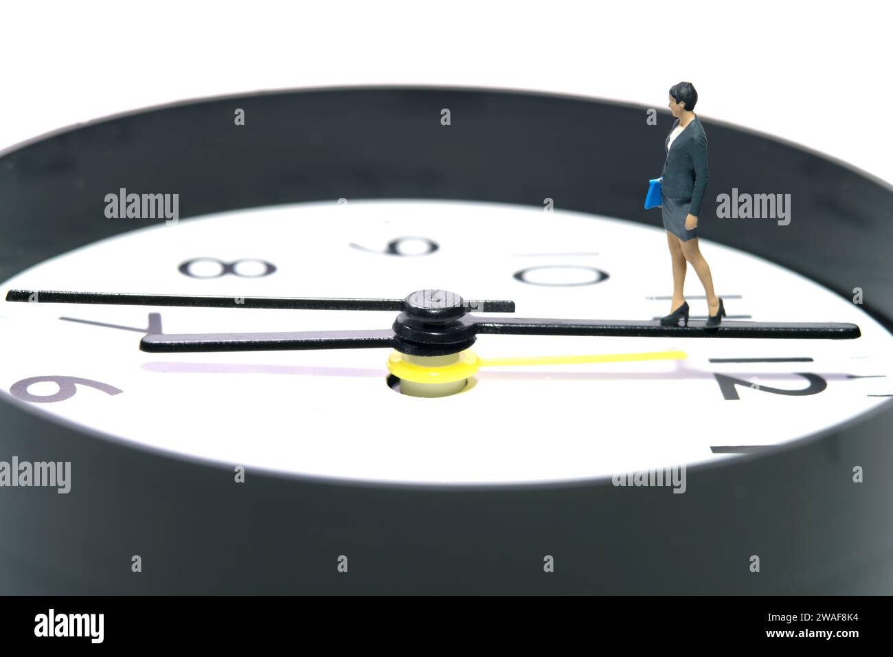 Miniature people toy figure photography. A businesswoman walking above ...