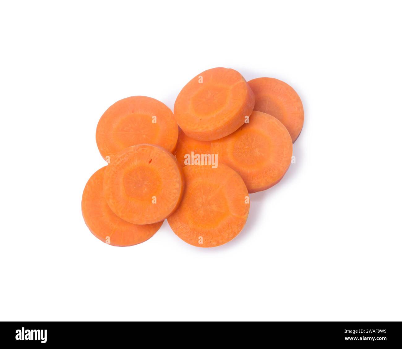 Fresh orange sliced carrots in stack are isolated on white background ...