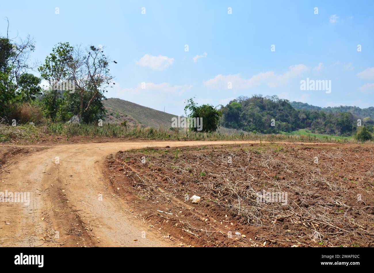 Non asphalt Lateritic road or laterite rouge soils red earth street on ...