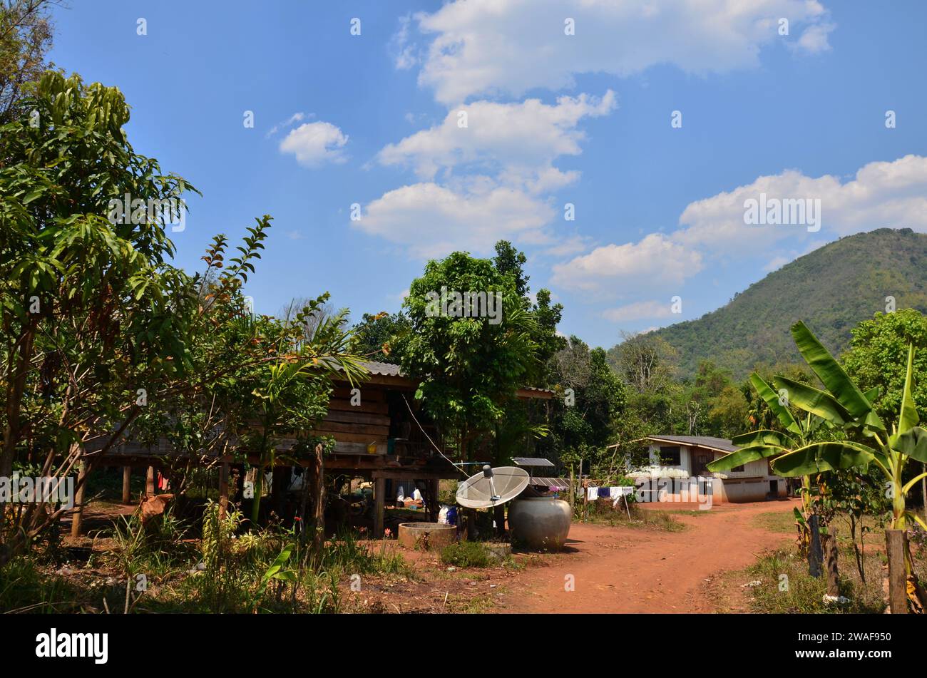 Exterior ancient wooden house or antique old wood home in Ban Taphoen ...