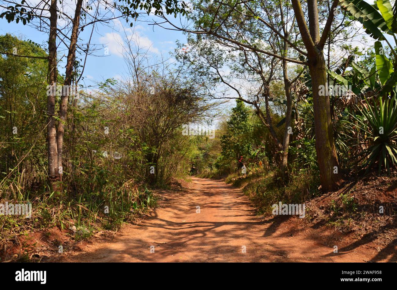 Non asphalt Lateritic road or laterite rouge soils red earth street on ...