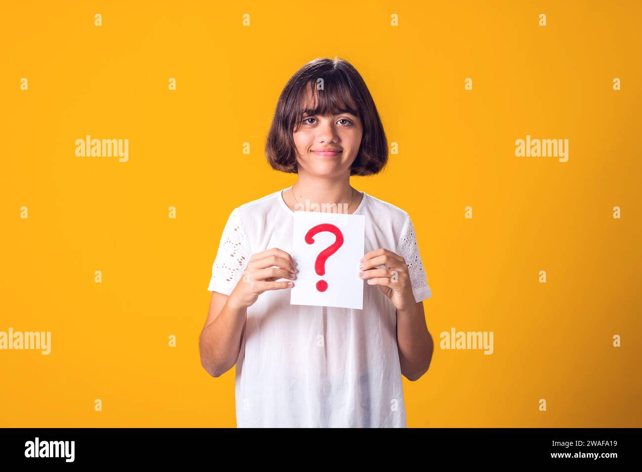 A portrain of kid girl holding question mark card. Children, idea and ...