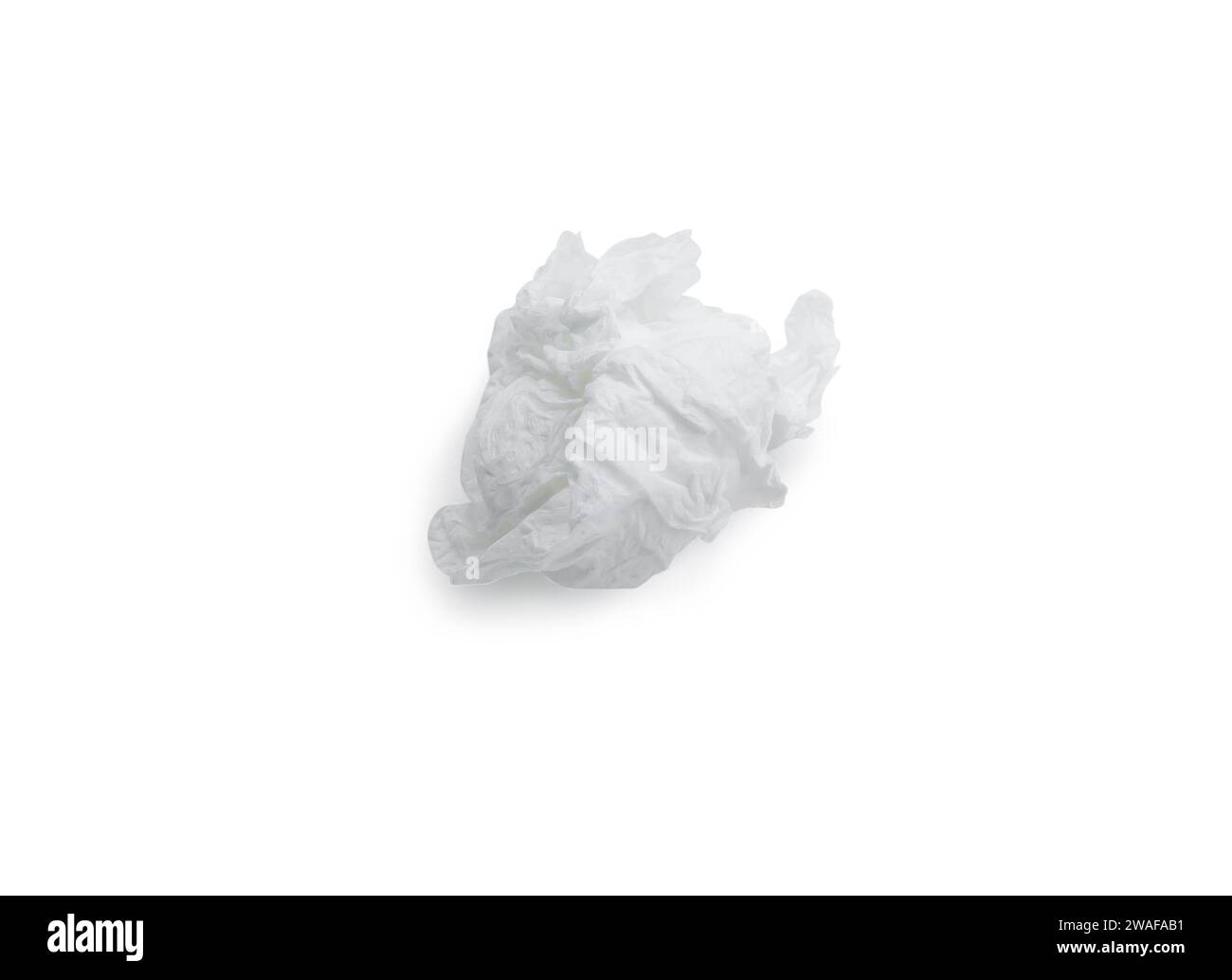 Single screwed or crumpled tissue paper after use is isolated on white ...