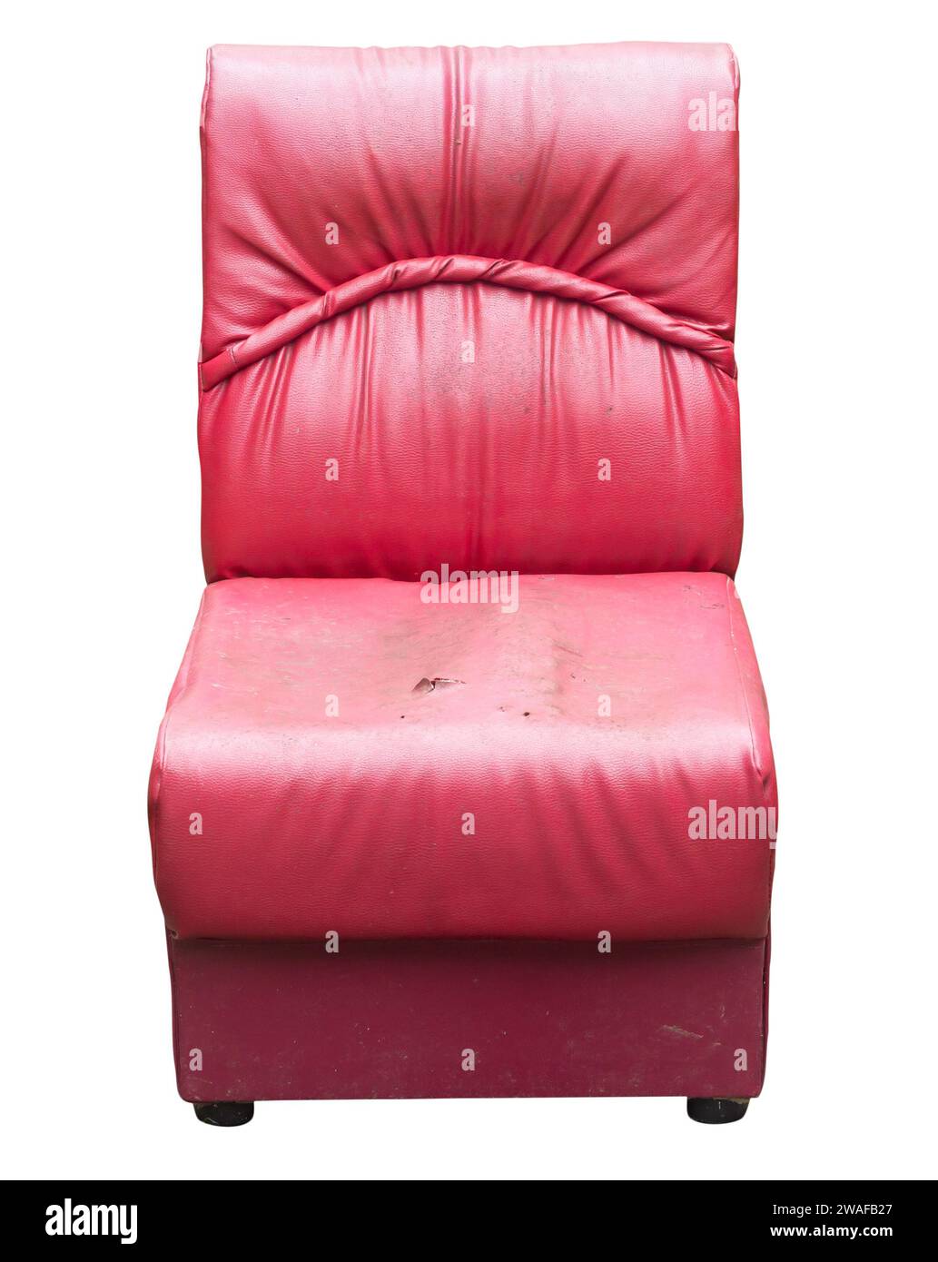 Red old damaged sofa is isolated on white background with clipping path ...