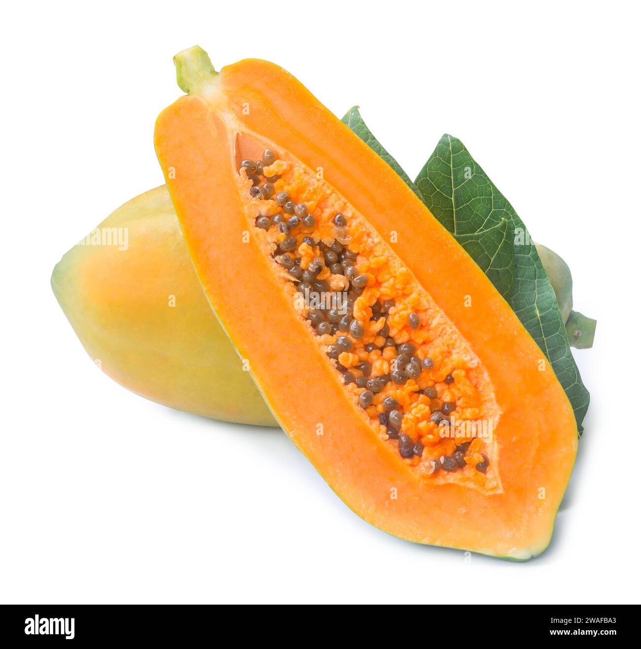 Whole fresh ripe orange papaya with half and leaves is isolated on ...