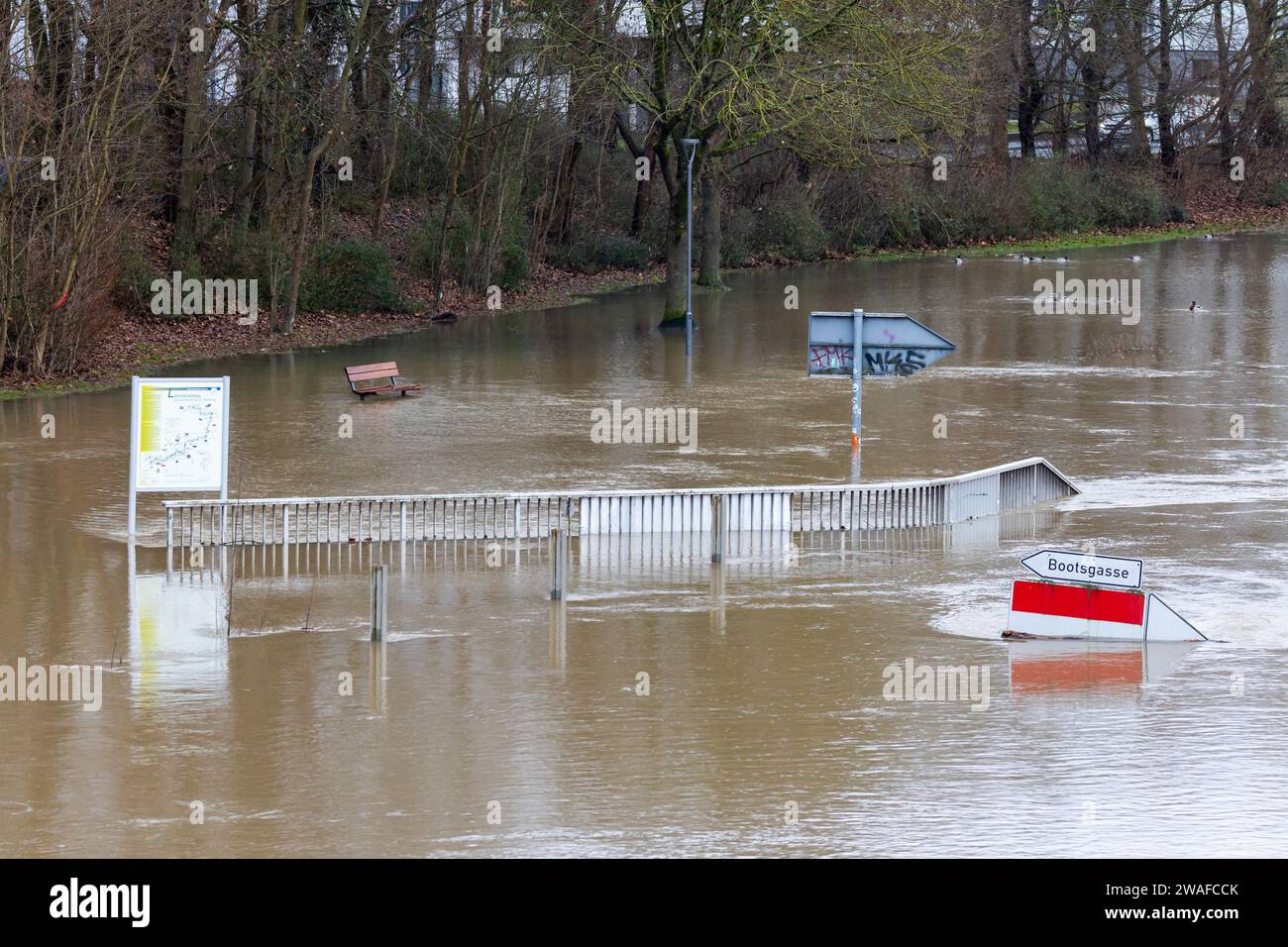 04 January 2024, Hesse, Gießen: The Lahn weir with boat ladder (front ...