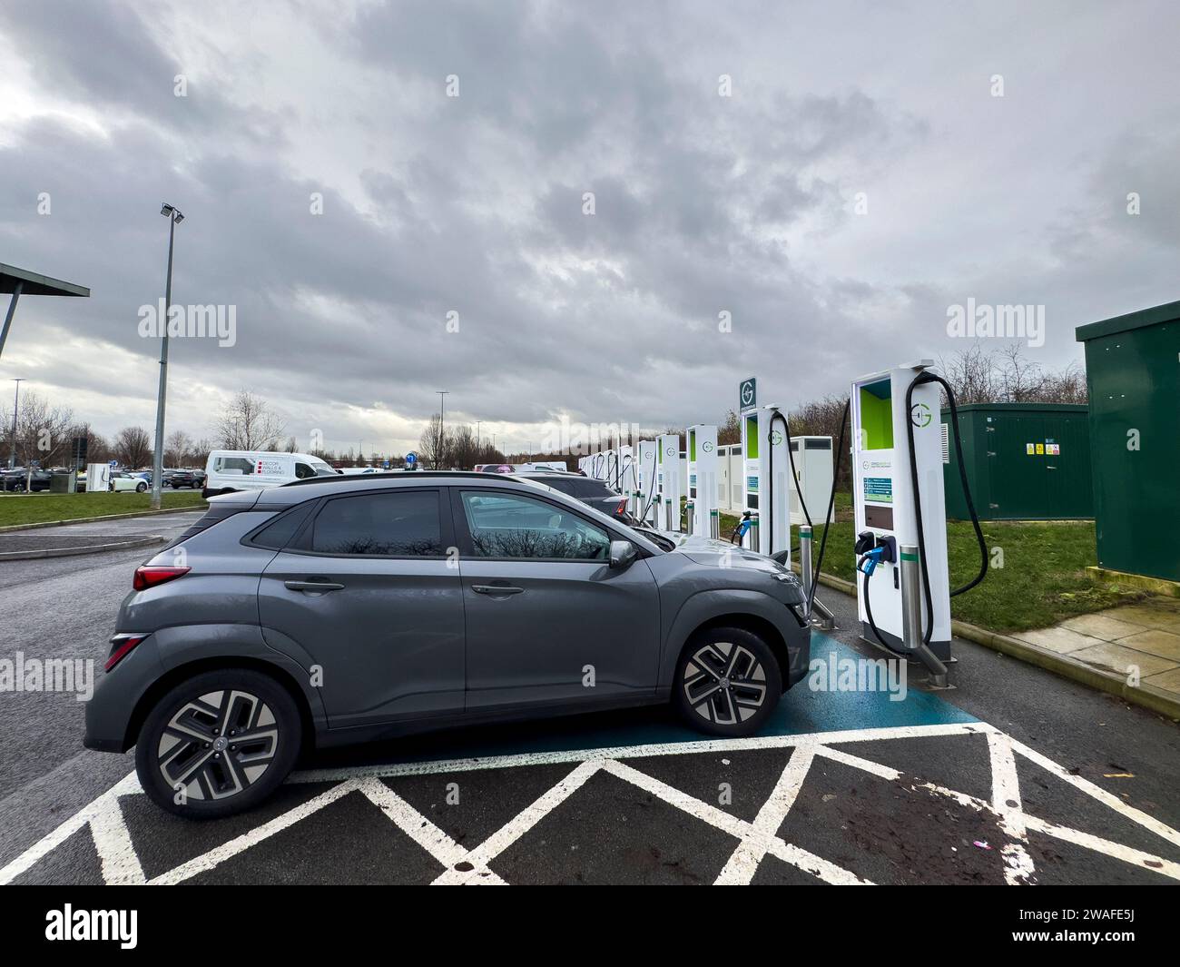MOTO Services, Wetherby, A1, Yorkshire, England, UK. Images of the EV electric vehicle charging ...