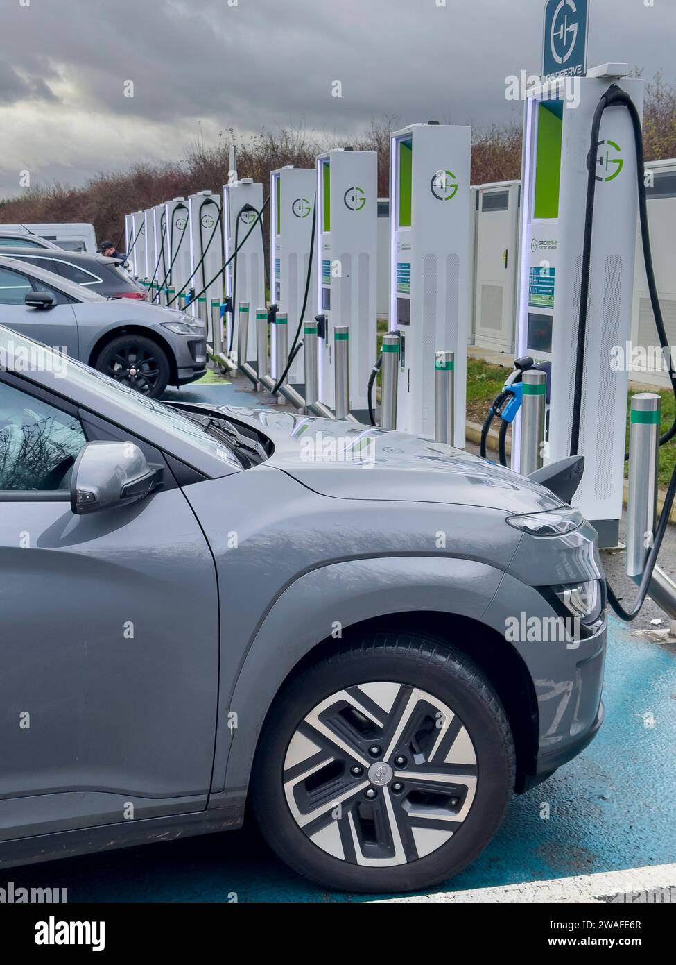 MOTO Services, Wetherby, A1, Yorkshire, England, UK. Images of the EV electric vehicle charging ...