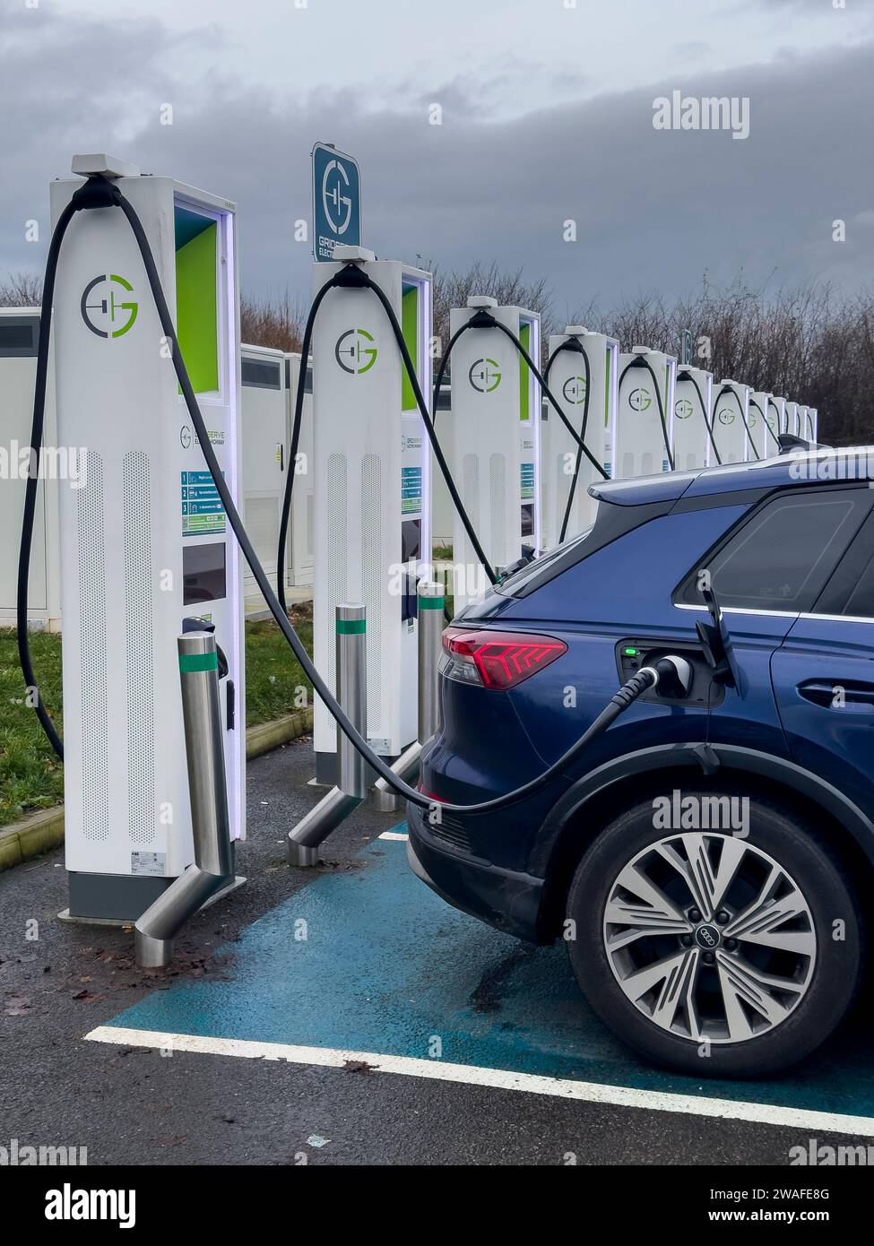 MOTO Services, Wetherby, A1, Yorkshire, England, UK. Images of the EV electric vehicle charging ...