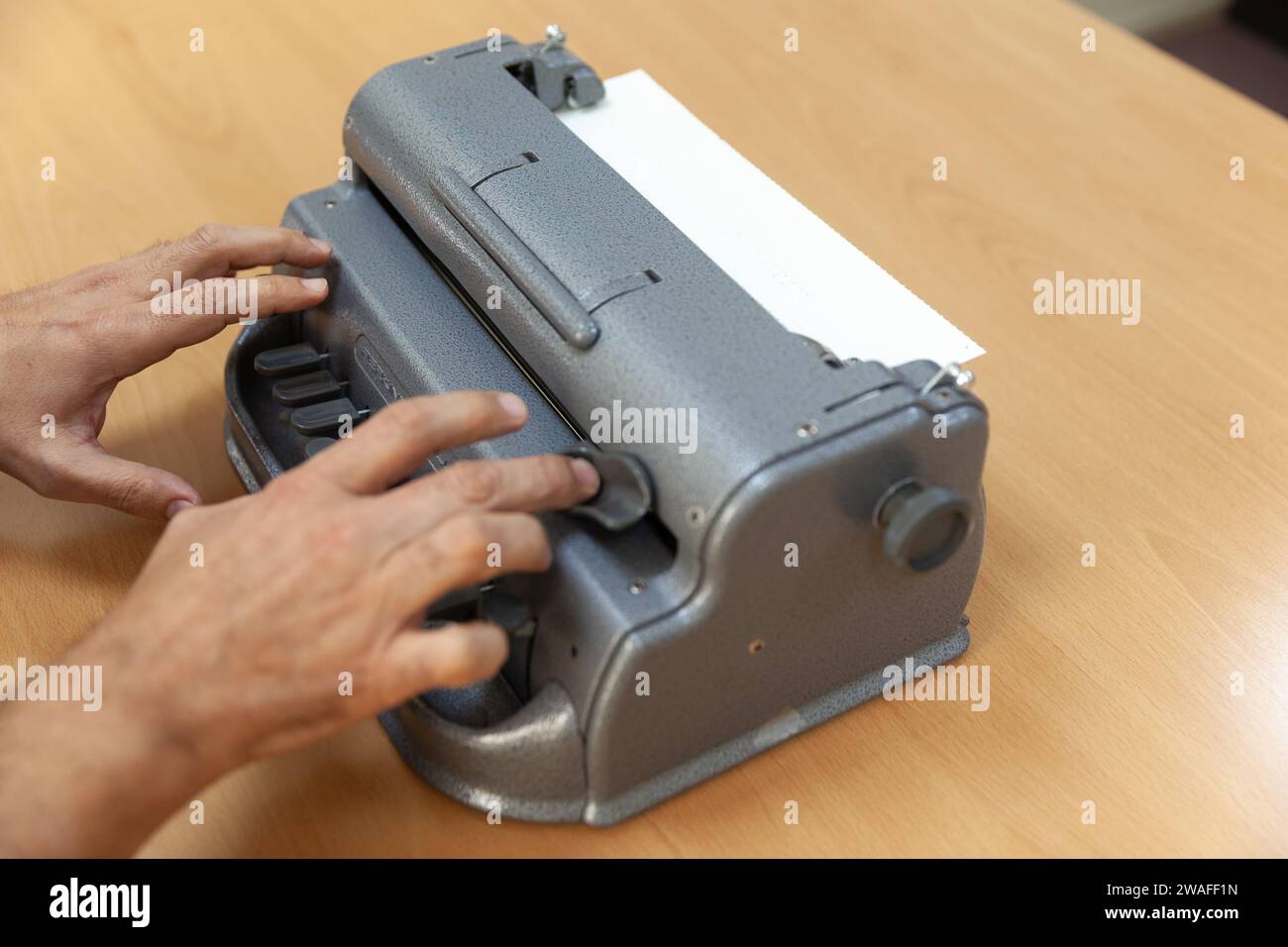 Blind or visually impaired person typing a Perkins Brailler Stock Photo ...