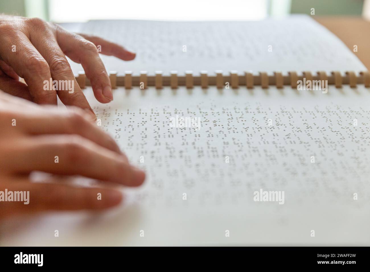 Hands and braille writing hi-res stock photography and images - Alamy