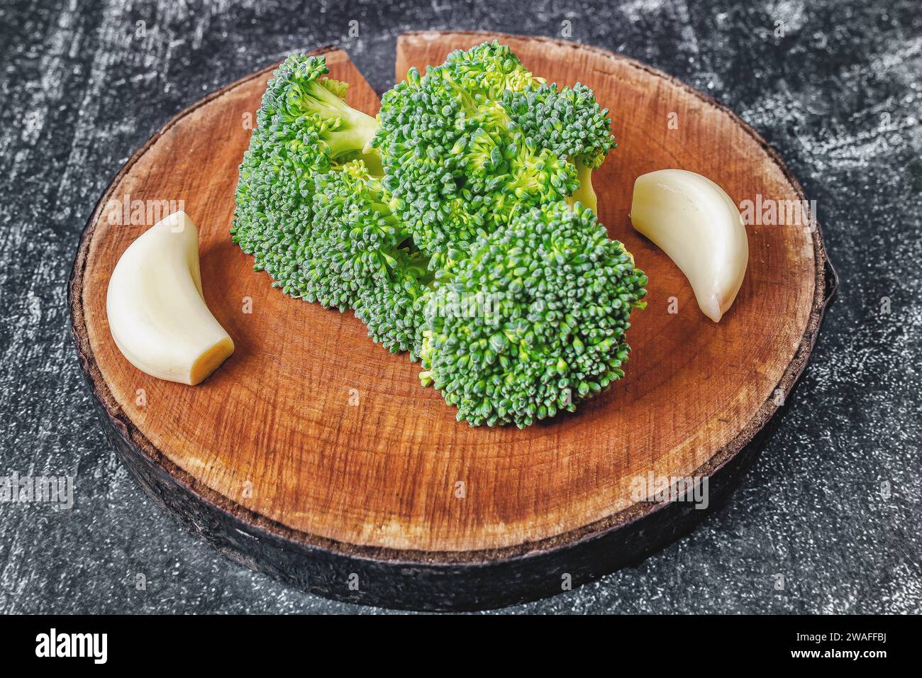 Green broccoli and garlic - still life image of food background. Top ...