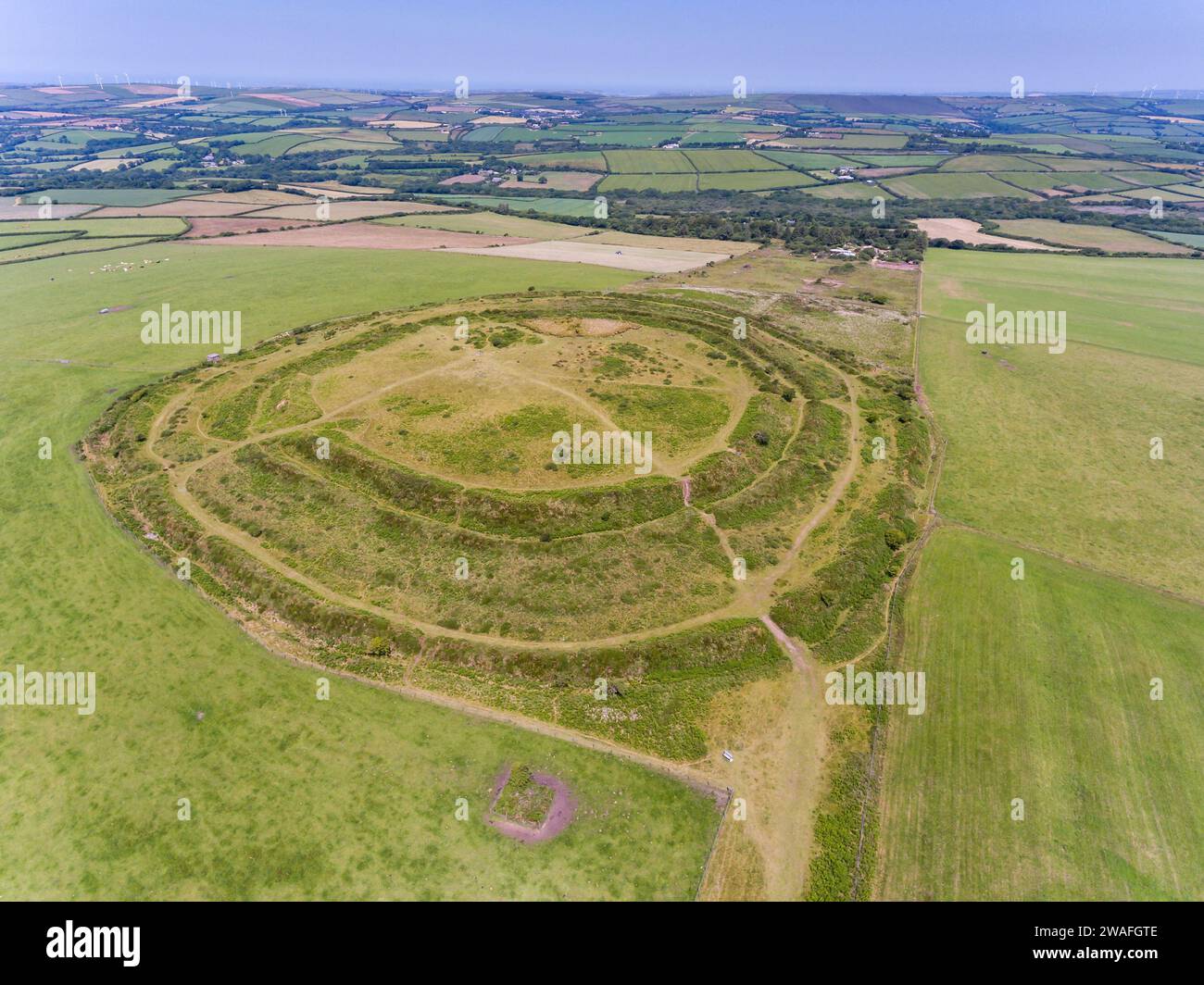 Aerial view of Castle an Dinas Iron Age hill fort in Cornwall from a ...