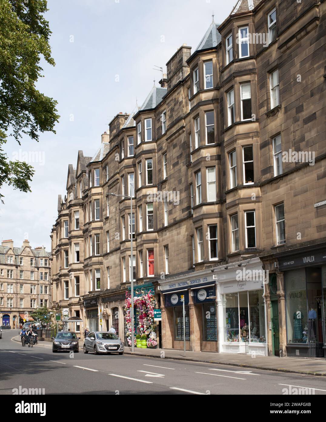 Views of tall buildings and shops on Bruntfield Place, Edinburgh in ...