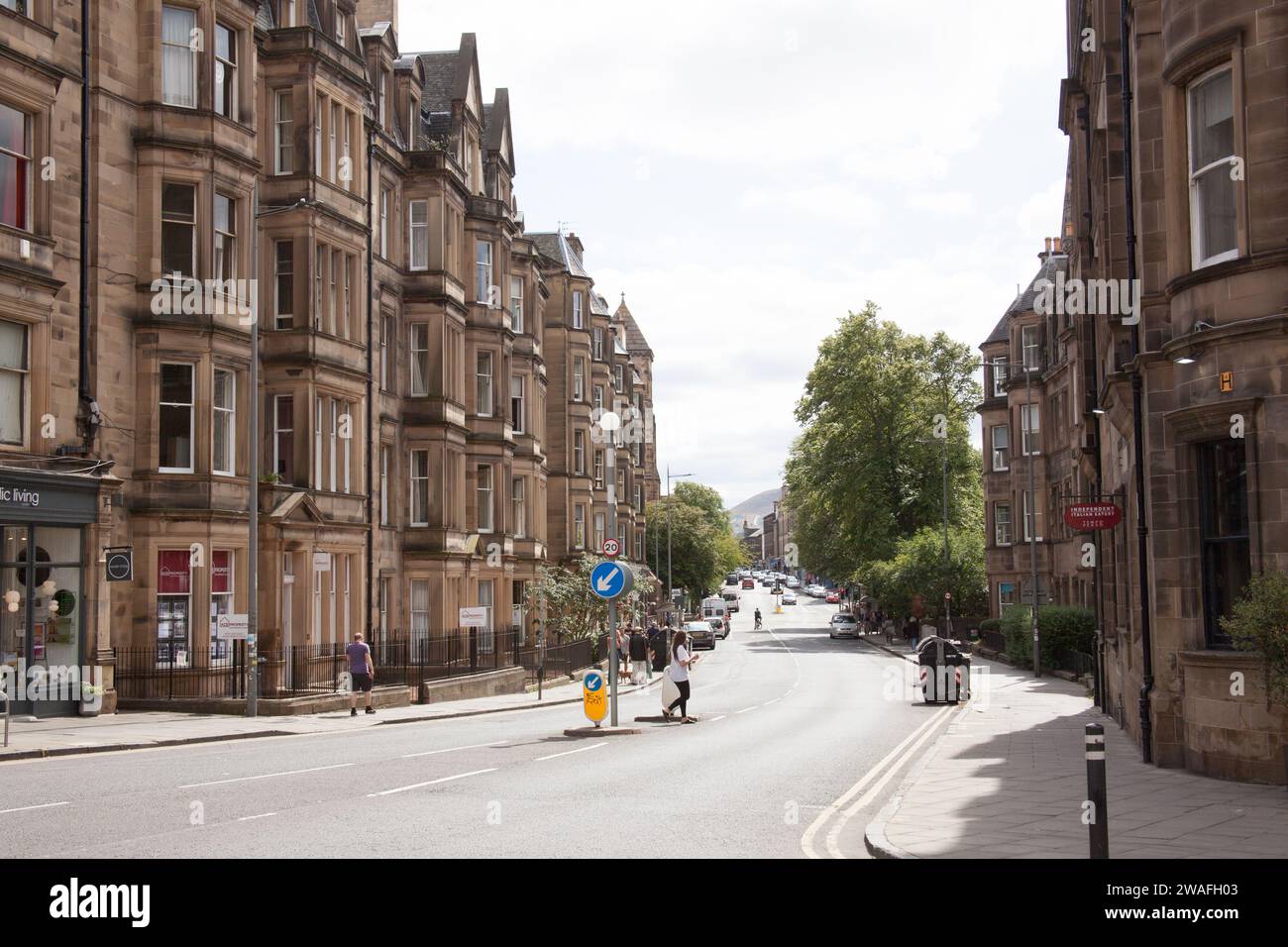 Views of the tall buildings and shops on Bruntfield Place, Edinburgh in ...
