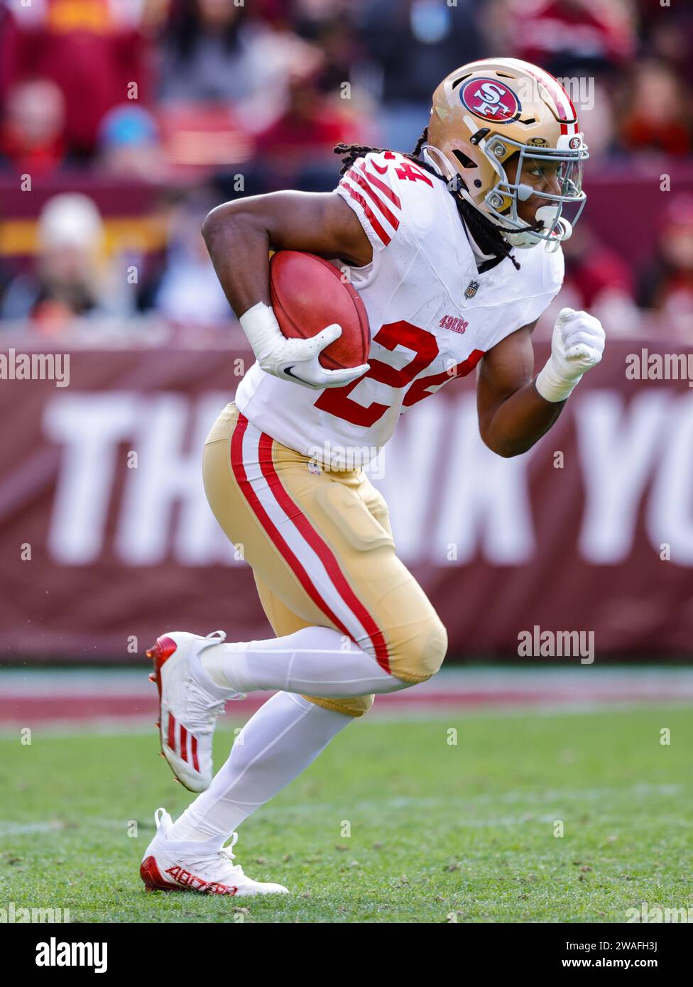 San Francisco 49ers running back Jordan Mason (24) with the kick return ...