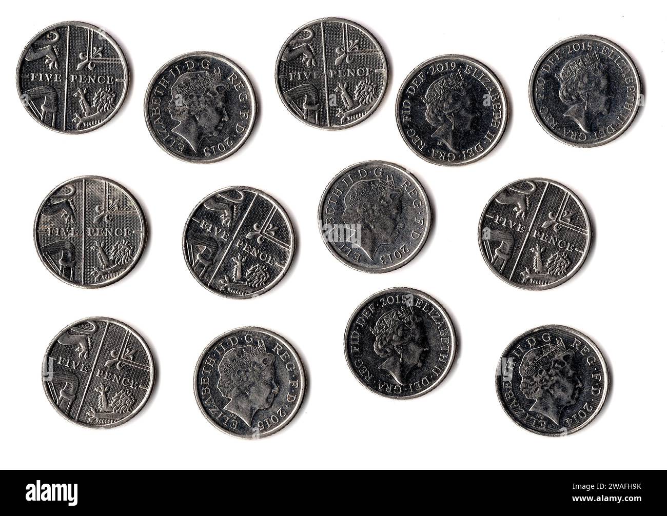 Five pence coins from the United Kingdom/Great Britain isolated on a ...