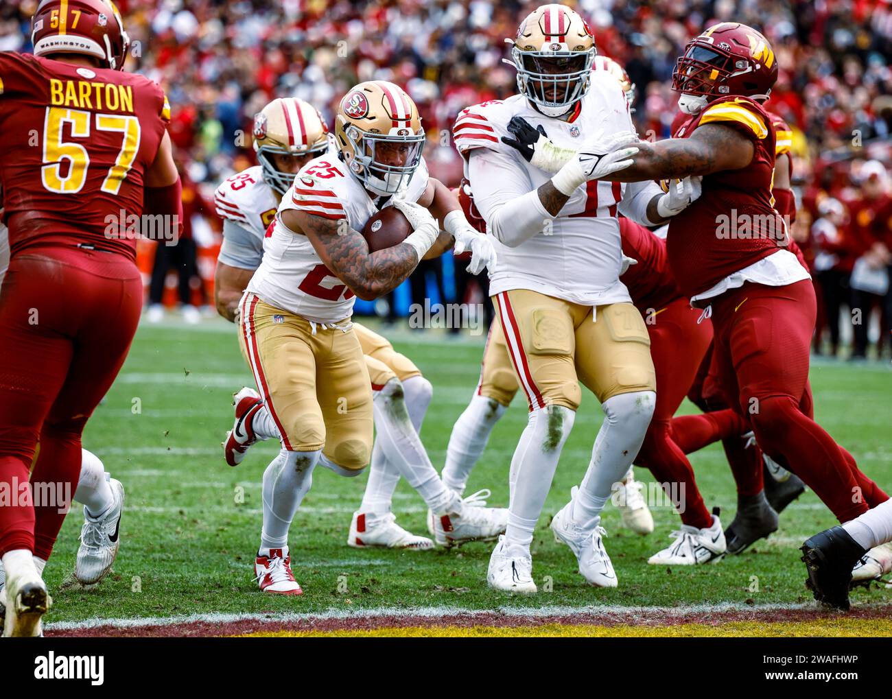 San Francisco 49ers running back Elijah Mitchell (25) with the carry ...