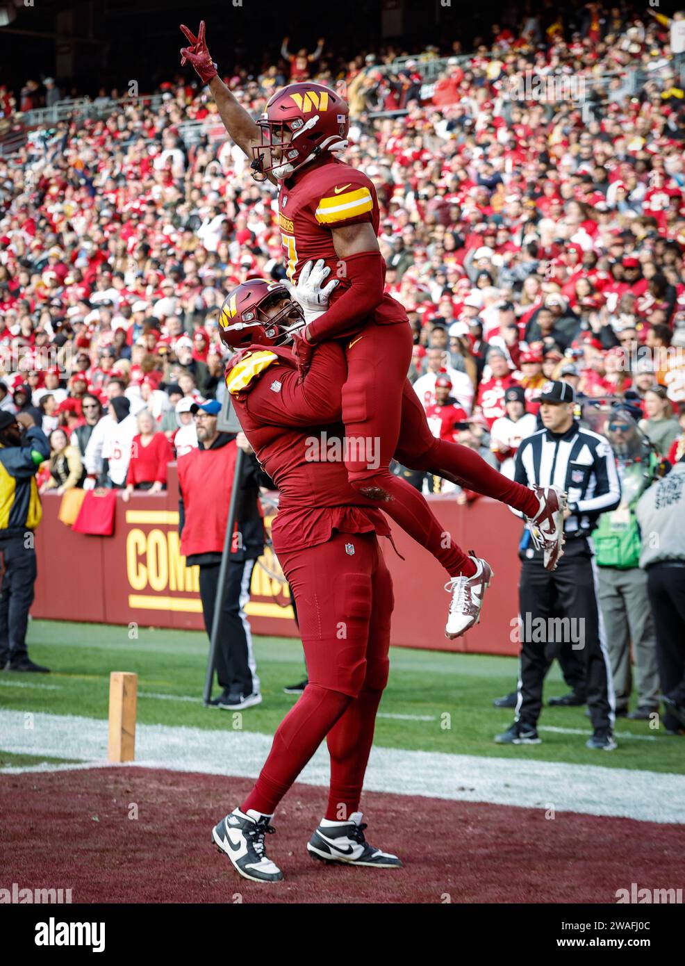 Washington Commanders wide receiver Terry McLaurin (17) being lifted by ...