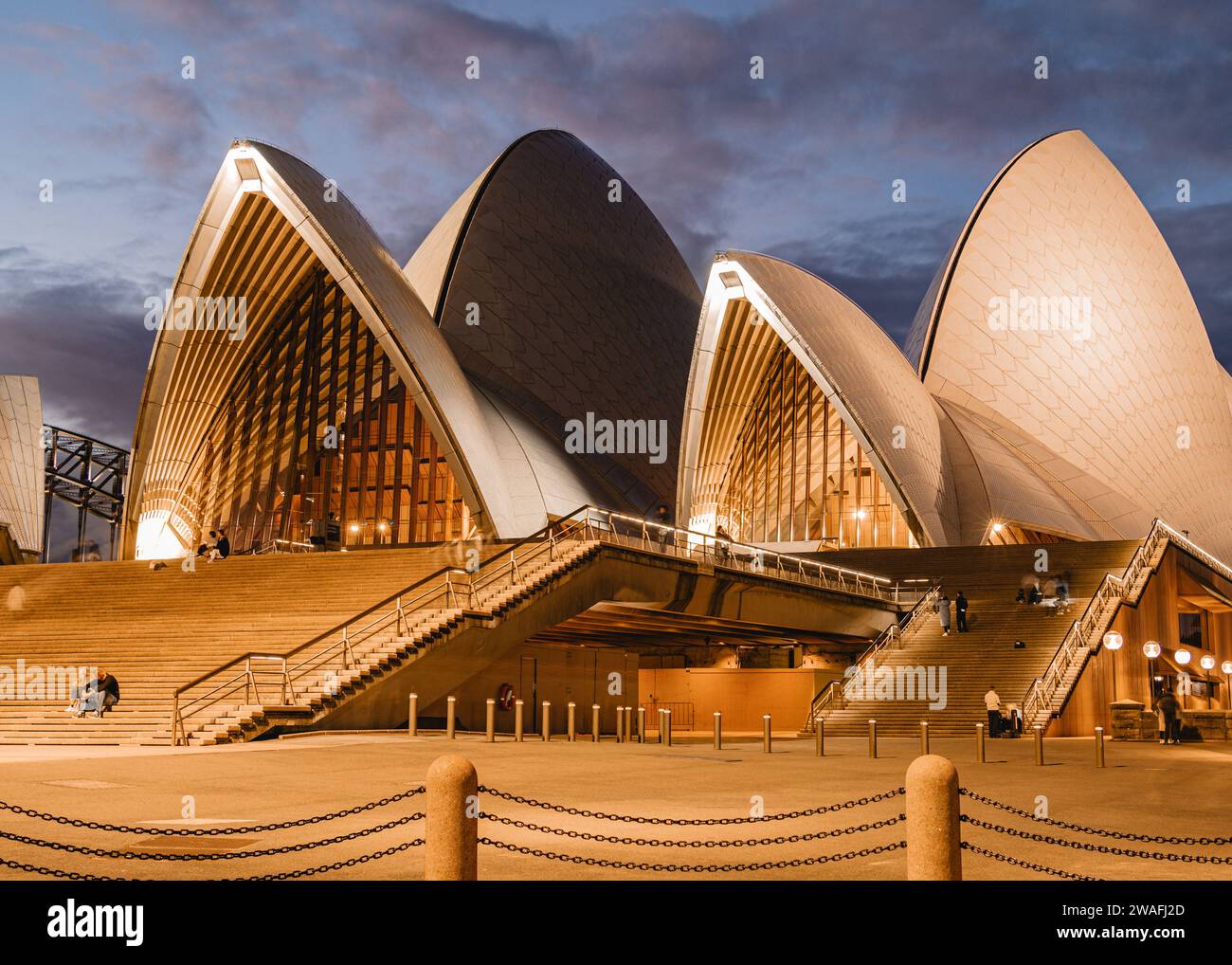 An iconic shot of the illuminated Sydney Opera House at night with the ...
