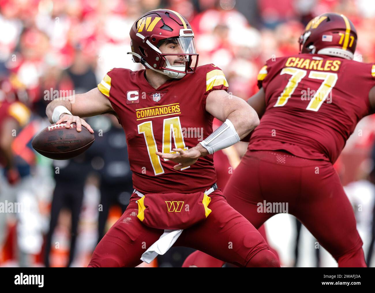Washington Commanders quarterback Sam Howell (14) searches for an open ...
