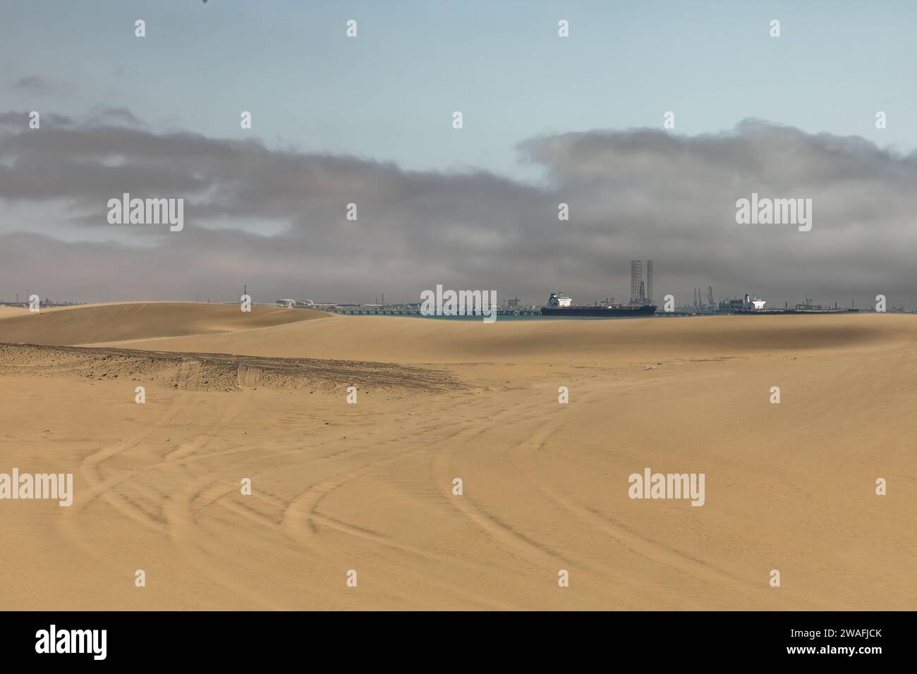 The port of Walvis Bay is seen beyond the sand dunes of the Namib ...