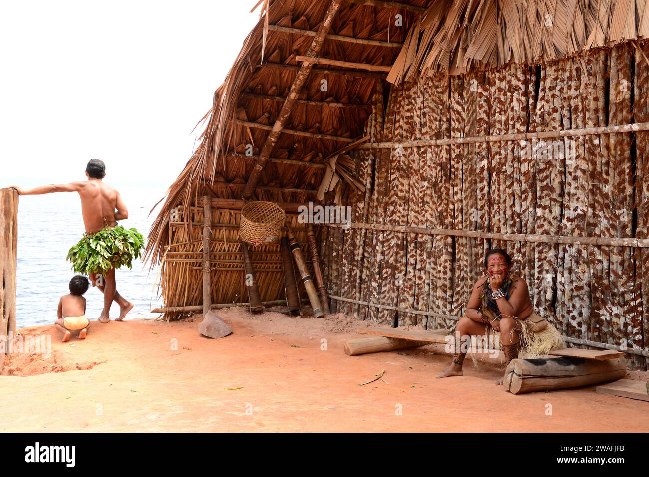 Tatuyo village near Manaus. Woman, man and boy. Brazil Stock Photo - Alamy
