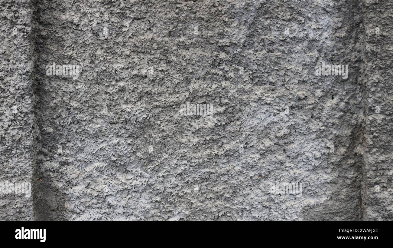 gray textured background of concrete surface with ribbed relief and ...