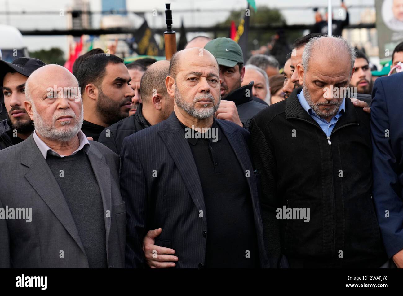 Palestinian Senior Hamas leader Moussa Abu Marzouk, center, attends the funeral of Saleh Arouri ...