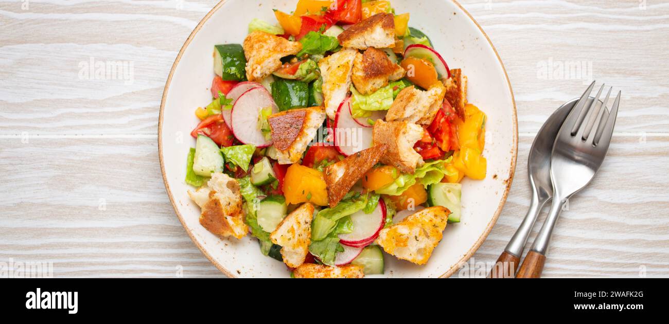 Traditional Levant dish Fattoush salad, Arab cuisine, with pita bread ...