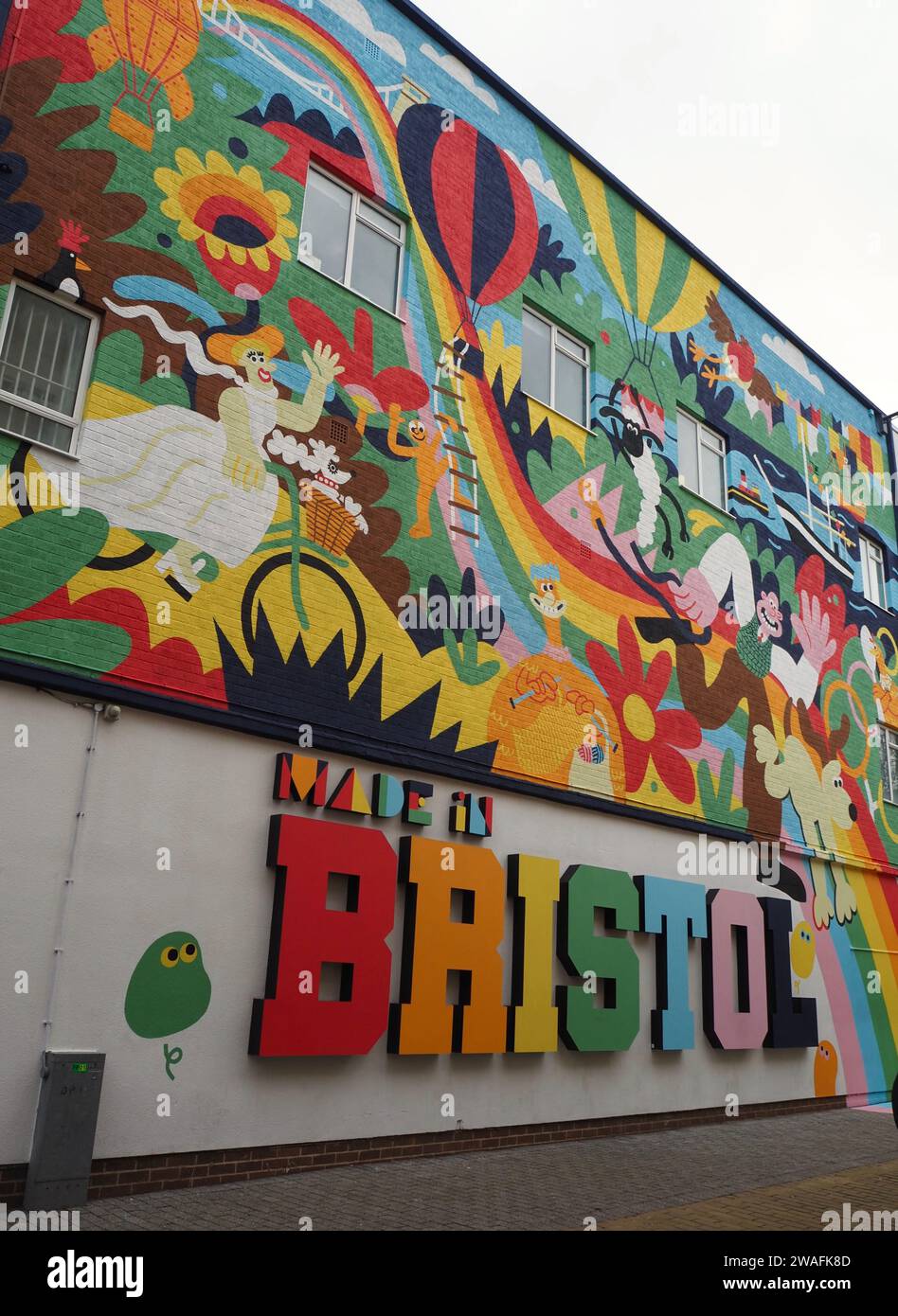 Brightly coloured graffitied wall off Broadmead, Bristol, entitled Made ...