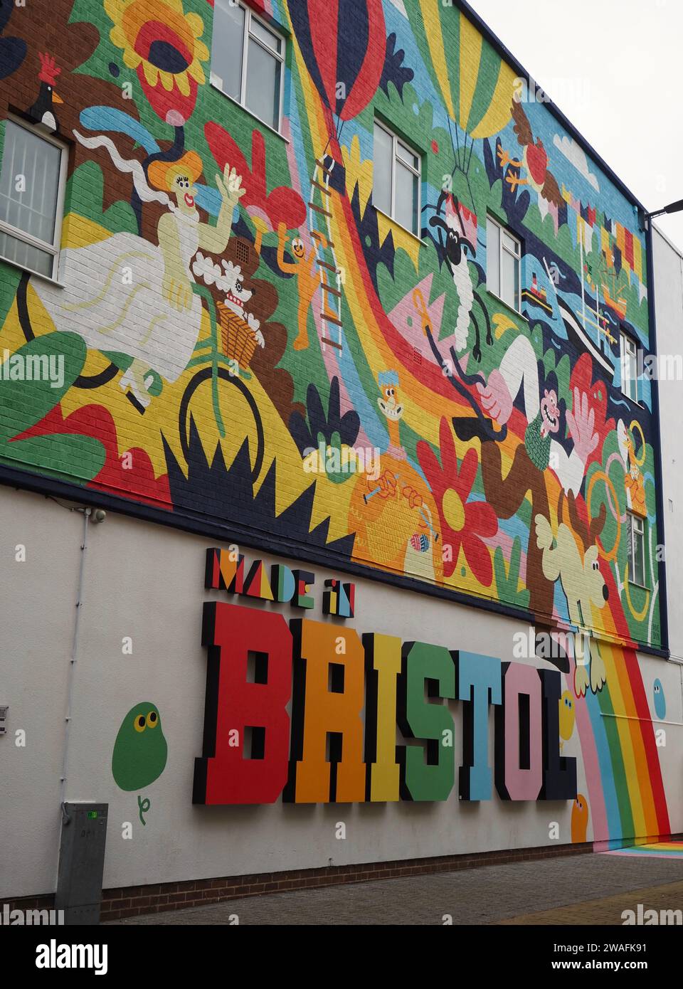 Brightly coloured graffitied wall off Broadmead, Bristol, entitled Made ...