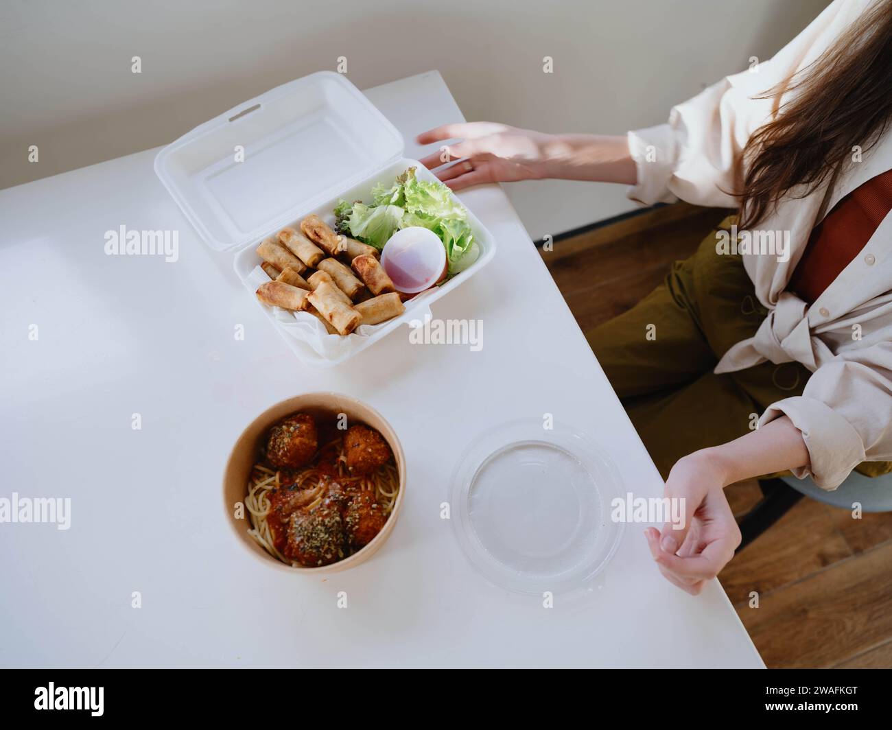 Food from delivery on the table in plastic utensils, a fast food ...