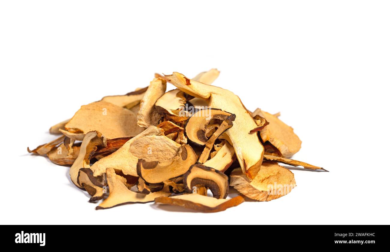 Dried porcini mushrooms against a white background Stock Photo - Alamy