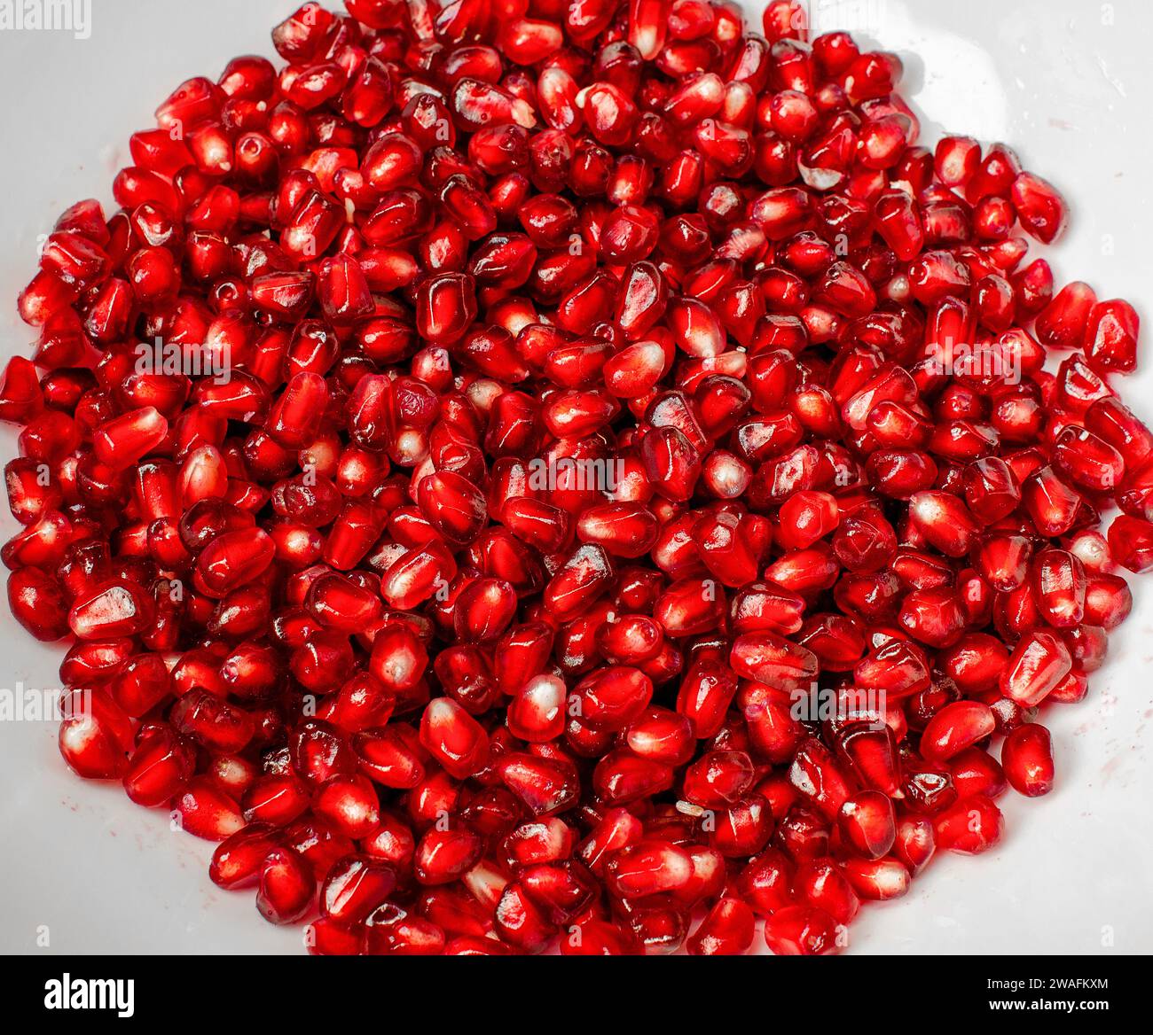 Red color fresh pomegranate berries. Berry texture. Pomegranate seeds ...