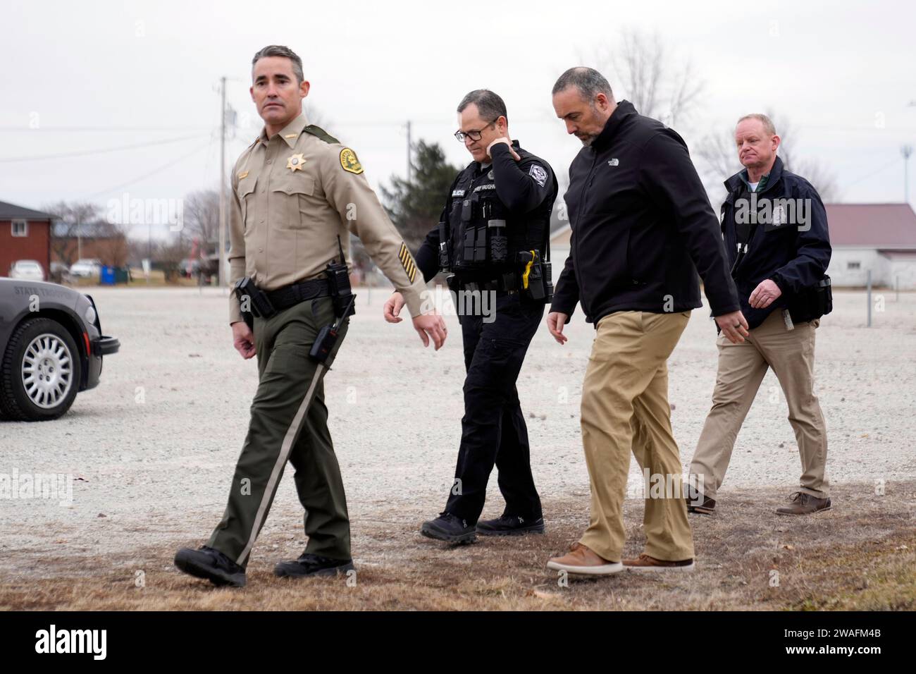 Dallas County (Iowa) Sheriff Adam Infante, left, arrives for a news ...
