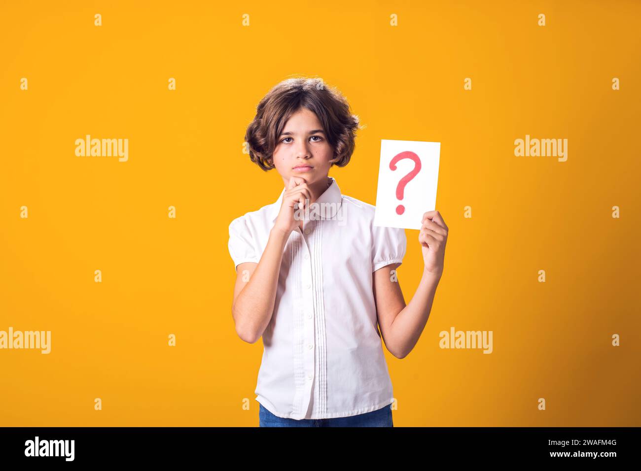 A portrain of kid girl holding question mark card. Children, idea and ...